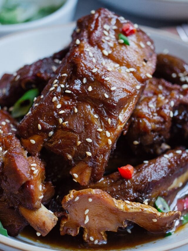 Easy Sticky Asian Pork Ribs Recipe - So addictive! - Eat With Carmen